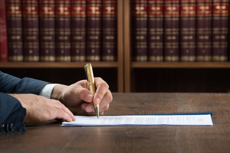 17837-Signing legal document (1) | Gosselin Law
